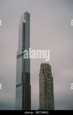 The skyscrapers and other buildings stand next to each other viewing ...