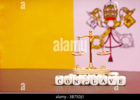 Mini scales and the inscription conclave on the background of the ...