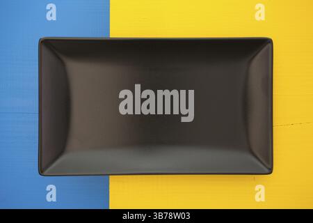 Empty ceramic bowl over black background Stock Photo - Alamy