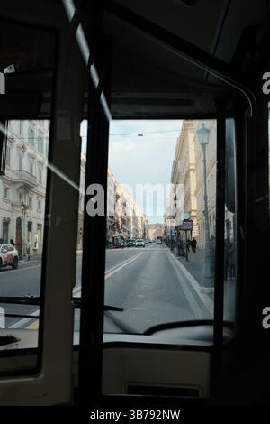A bus driving on the street in a rainstorm night Stock Photo - Alamy