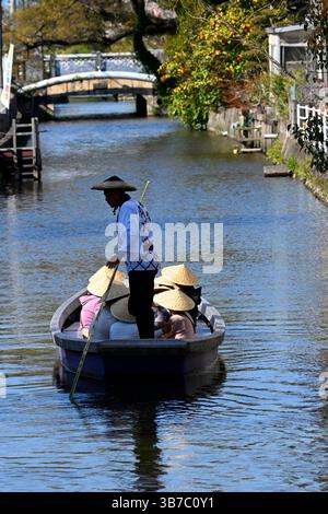 Boatman of Yanagawa, who punt traditional boats known as donko-bune ...