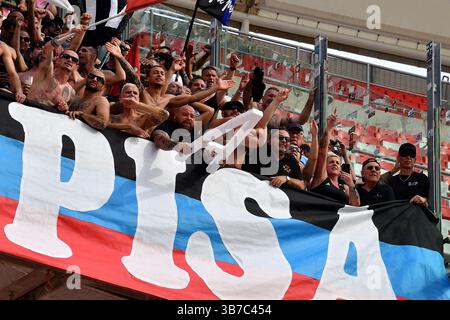 Fans of Pisa during SSC Bari vs AC Pisa, Italian soccer Serie B match ...