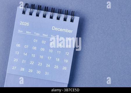 December 2026, Monthly desk calendar for 2026 year on yellow and blue ...