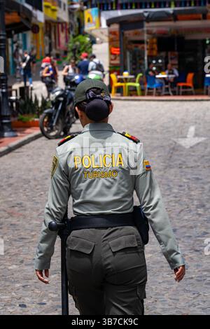 A police officer patrols a street in Port-au-Prince, Haiti, Monday, Jan ...
