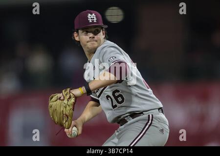 March 05, 2024: Mississippi St. infielder David Mershon (3) throws back ...