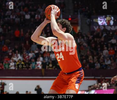 Clemson center PJ Hall (24) blocks a shot by Pittsburgh guard Jamarius ...