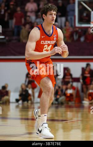 Clemson center PJ Hall (24) blocks a shot by Pittsburgh guard Jamarius ...
