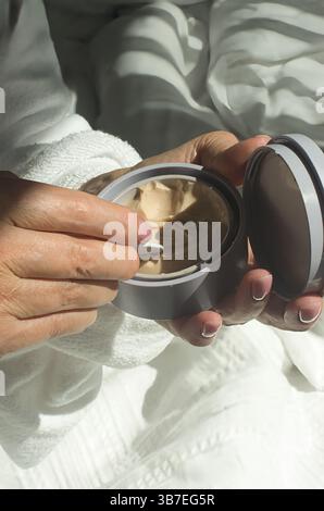 Woman holding open jar with cream, closeup Stock Photo - Alamy