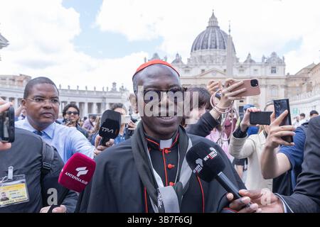 Cardinal Ignace Bessi Dogbo leaves St. Peter's Square after the twelfth ...