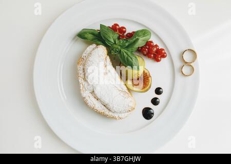 Overhead view of wedding rings with leaves on tree stump Stock Photo ...