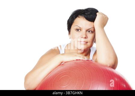 Fat woman with big red ball Stock Photo - Alamy