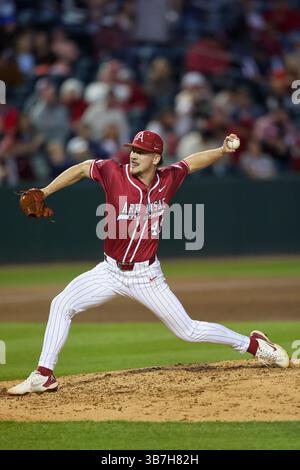 March 12, 2024: Razorback pitcher Dylan Carter #31 follows through on ...