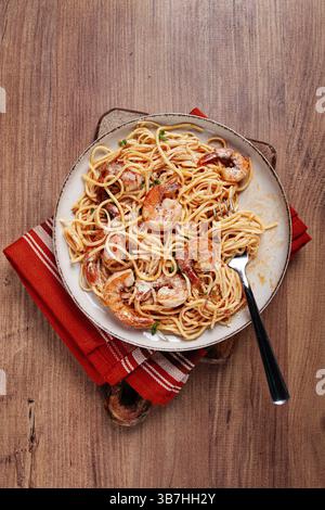 Spaghetti with tiger prawns, in tomato sauce, homemade, top view, no ...
