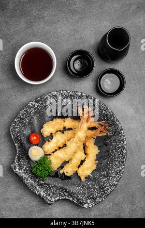 Crispy Japanese Ebiten deep fried Shrimp Tempura on grey background ...