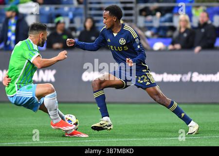 Vancouver Whitecaps forward Ali Ahmed (22) dribbles the ball past the ...