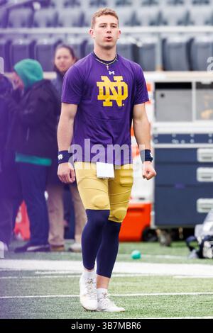 Notre Dame quarterback CJ Carr, right, center, scores a touchdown past ...