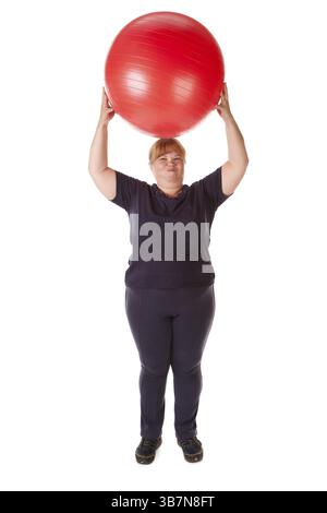 Fat woman with big red gimnastic ball Stock Photo - Alamy