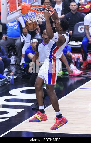 Detroit Pistons' Jalen Duren dunks over Milwaukee Bucks' Kyle Kuzma ...