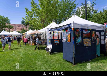 People browsing and shopping at the annual Moab Arts Festival in Moab ...