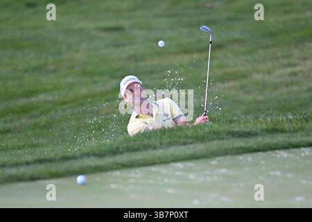 Denny McCarthy hits out of the 11th green bunker during the first round ...