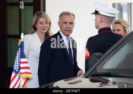 Prime Minister Mark Carney departs Vancouver International Airport, in ...