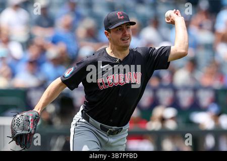 Cleveland Guardians starting pitcher Logan Allen delivers against the ...