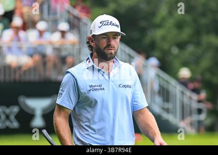 Cameron Young walks to the tee green on the first hole during a ...