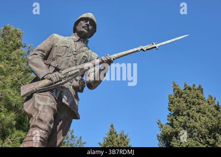 A large, bronze statue, sculpture of a typical, brave Turkish soldier ...