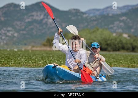 Young Man Kayaking on Lake, Kayaking Underwater View, Split Shot Stock ...