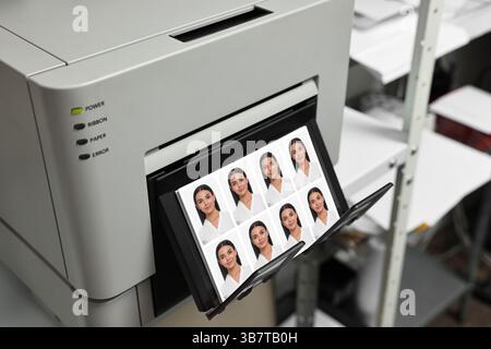 Modern printer with passport photos of woman indoors, closeup Stock ...