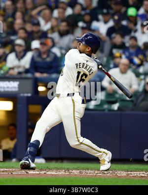Milwaukee Brewers' Blake Perkins hits an RBI single during the first inning in Game 1 of ...