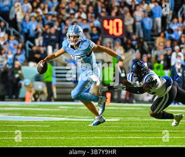 North Carolina quarterback Drake Maye (10) throws during the Holiday ...