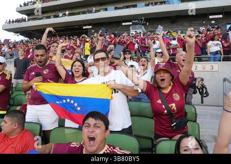 Fans cheer prior to the first half of a World Cup Group E soccer match ...