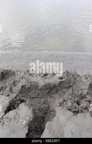 Coastline touching land Stock Photo - Alamy