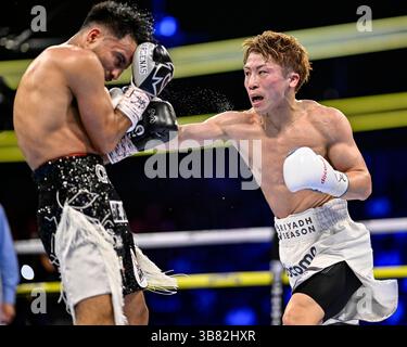 Champion Naoya Inoue (white gloves) of Japan and Ramon Cardenas (black ...