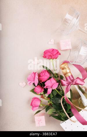 Bottle of wine, rose flowers and hearts on turquoise background ...