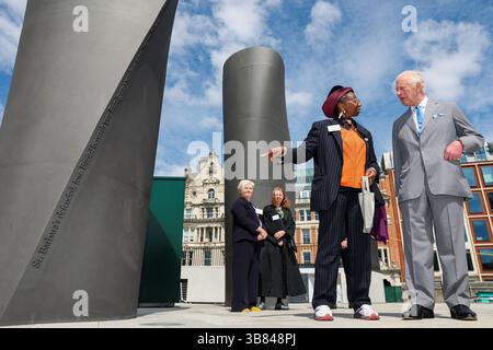 King Charles III speaks with a poet Dorothea Smartt, whose poetry about ...