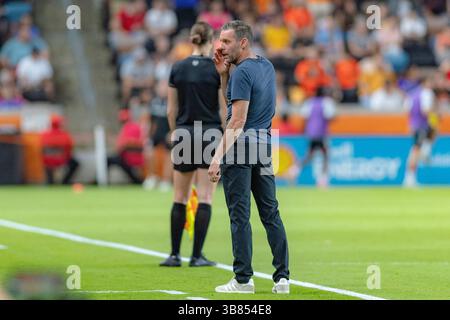 Houston Dynamo head coach Ben Olsen watches play against the Vancouver Whitecaps during the ...