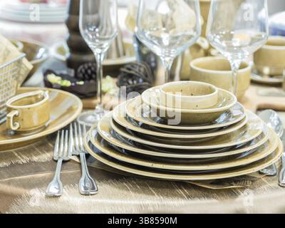 pile of empty wine glasses on table Stock Photo - Alamy