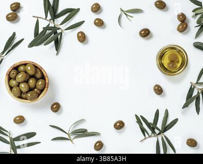 olives in own oil on plate, isolated Stock Photo - Alamy