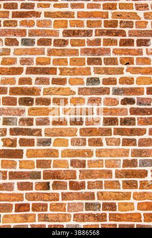 old red brick falling apart wall texture background Stock Photo - Alamy