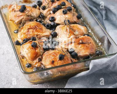 Corsican chicken thighs with rosemary and black olives Stock Photo - Alamy