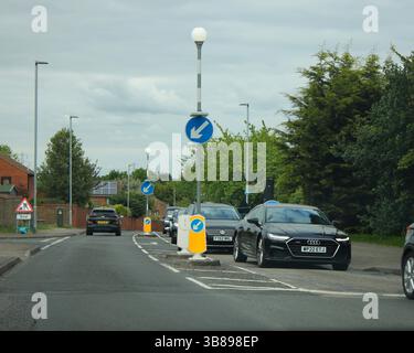 Mini Roundabout road sign. A British highway code sign, a round circle ...