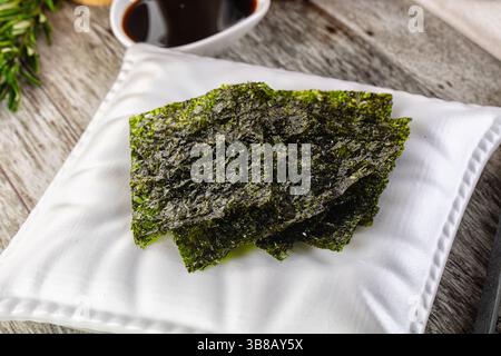 Seaweed roasted nori chips heap snack Stock Photo - Alamy