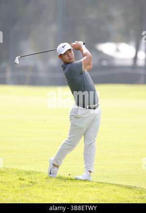 Tom Kim, of South Korea, hits his tee shot on the 14th hole during the ...