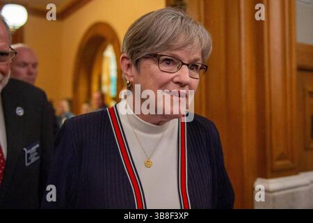 Kansas Gov. Laura Kelly enters the House chambers to deliver her State ...