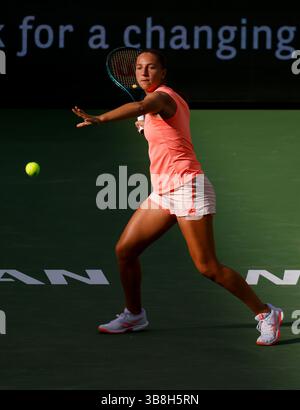 Diane Parry, of France, returns a shot to Renata Zarazua, of Mexico ...