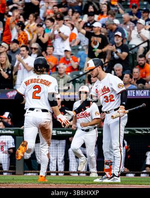 Baltimore Orioles' Gunnar Henderson, left, and Jackson Holliday (7 ...
