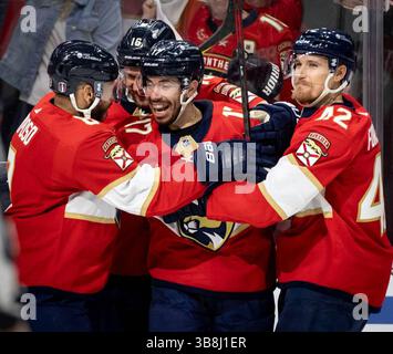 Florida Panthers' Evan Rodrigues (17) backhands a rebound past ...