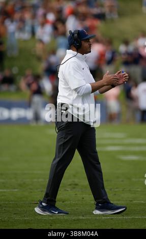 Virginia head coach Tony Elliott watches a replay during the second ...